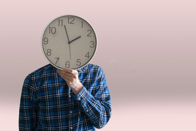 A Time Management Concept, Employee Person Holding a Clock Stock Photo ...