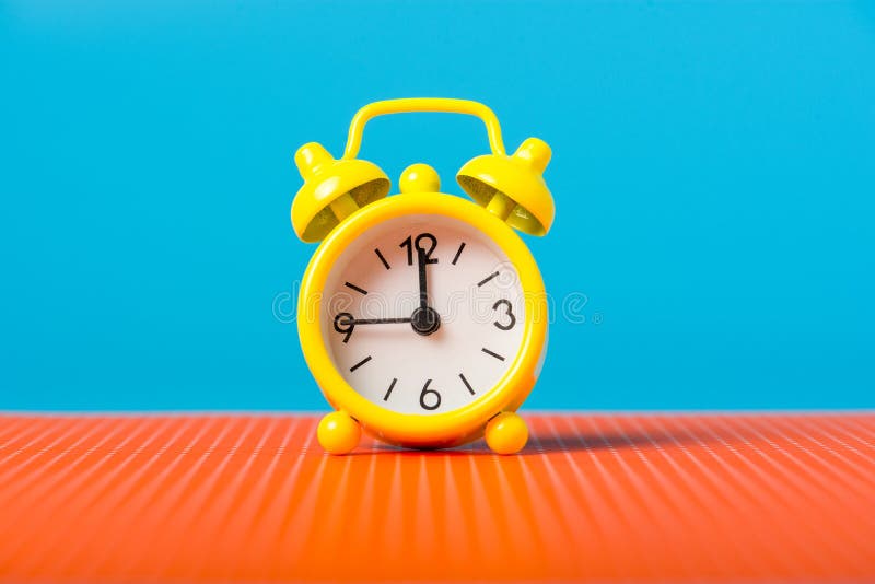 Time Management Concept. Yellow Alarm Clock on the Desk Stock Image ...