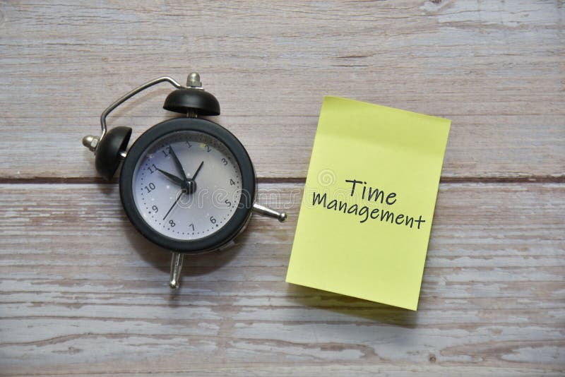 TIME MANAGEMENT Text on Sticky Note with Analog Alarm Clock. Business ...