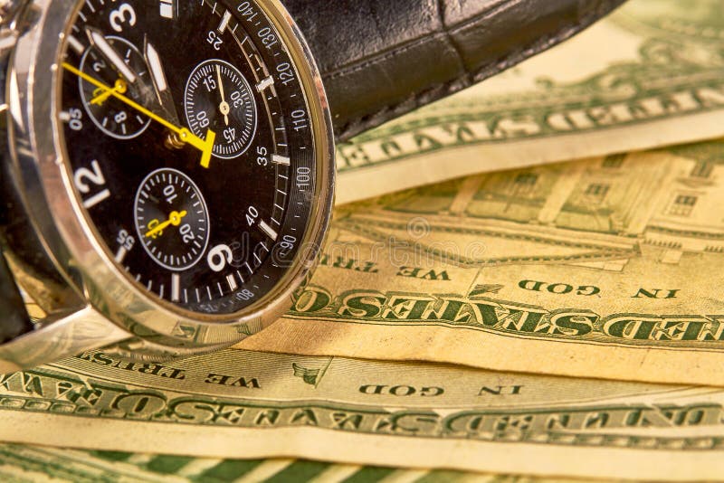 Time is Money stock photo. Image of watch, banknotes - 71632154