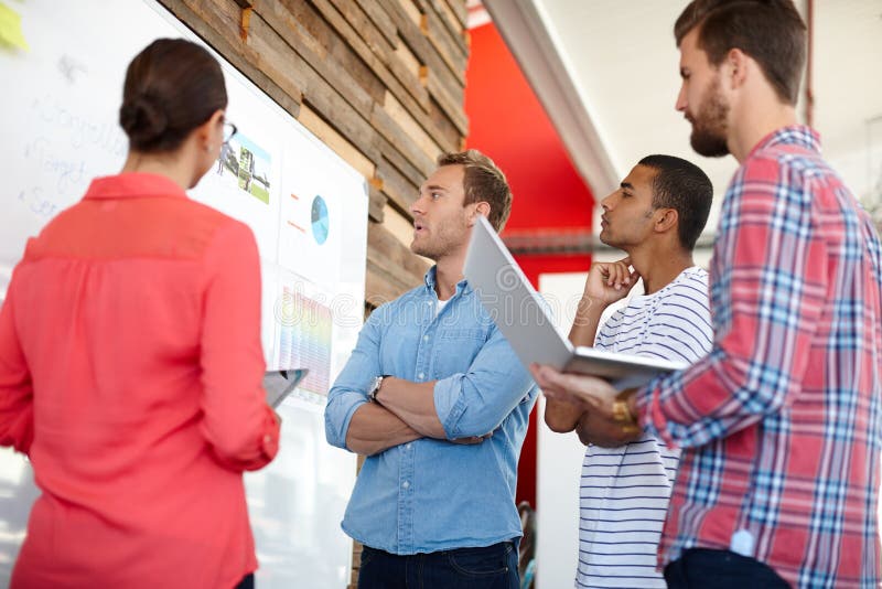 Time for a New Perspective. a Group of Young Designers Brainstorming at ...