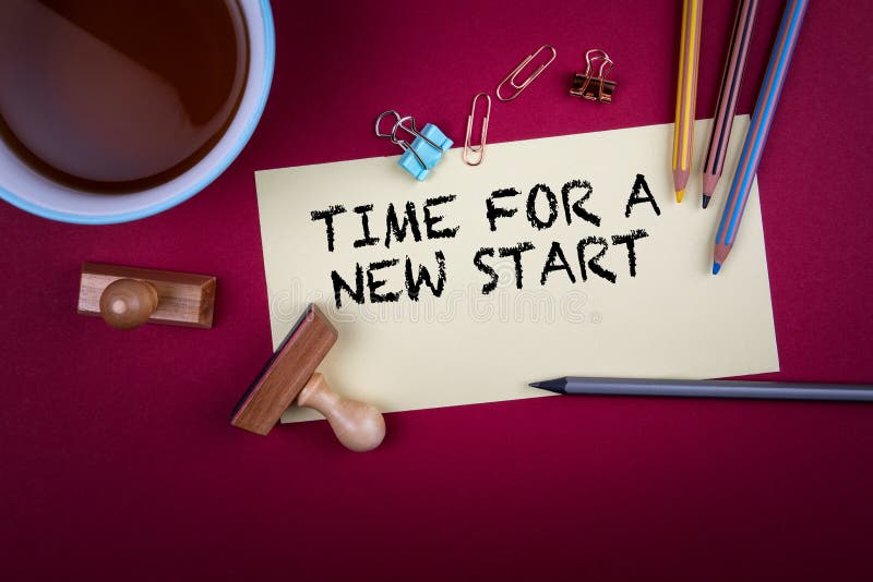 Time for a New Start. Tea Cup and Colored Pencils on a Red Table Stock ...
