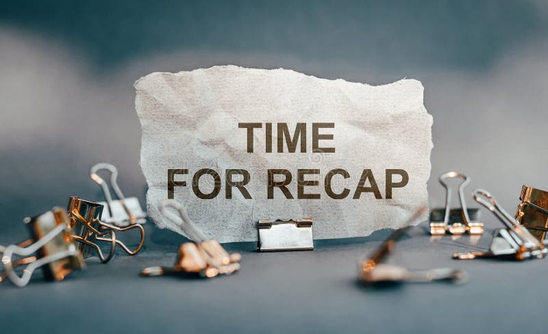 Time for Recap: a Note with Binder Clips on a Gray Surface Stock Photo ...