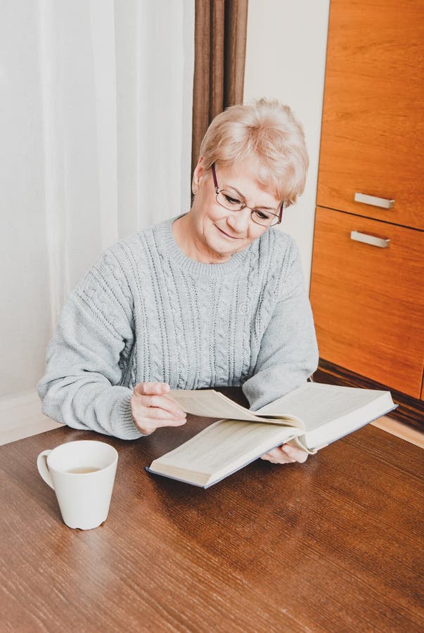 Time for relax with book stock photo. Image of woman - 145806894