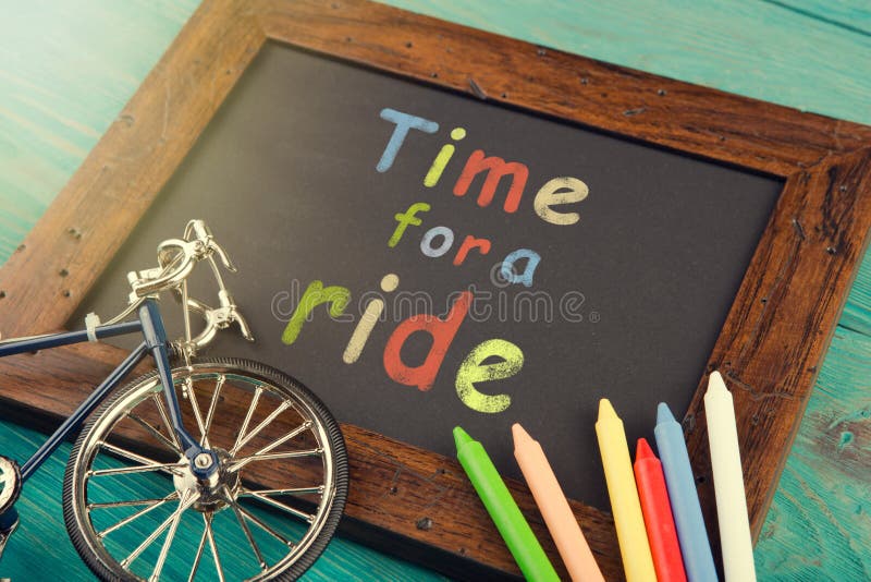 Time for a Ride - Written with Crayons on the Chalkboard Stock Photo ...