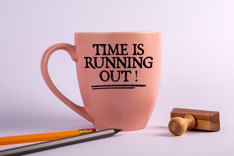 Time is Running Out. Coffee Mug and Office Supplies on a White ...