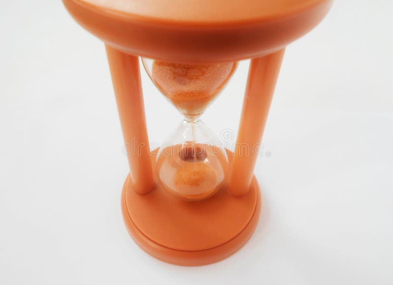 An Orange Hourglass Lies in the Shade Stock Image - Image of planning ...