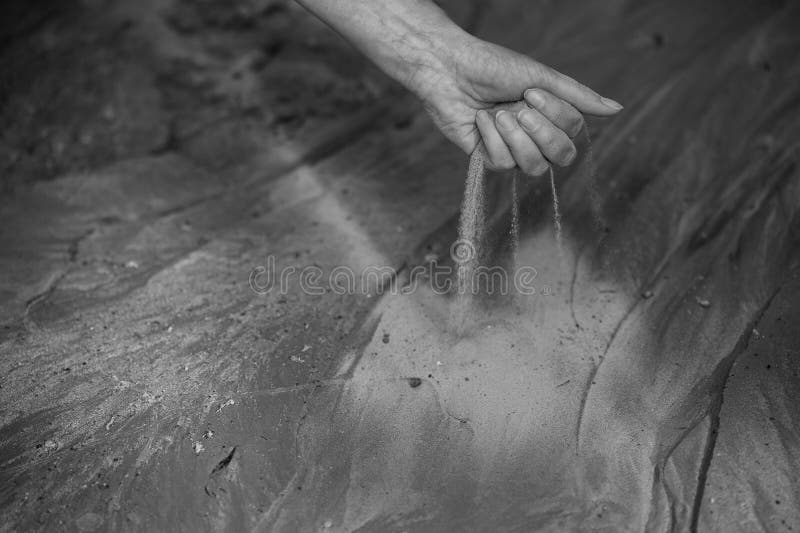 Time Slipping through Fingers in Grains of Sand Stock Image - Image of ...