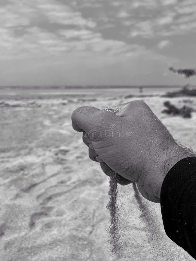 Time Slips through Your Hands Stock Photo - Image of wind, hands: 335260144