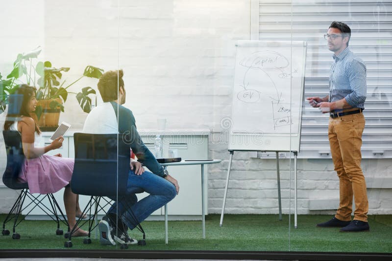 Time for a Strategy Meeting. a Group of Colleagues Having a Meeting in ...