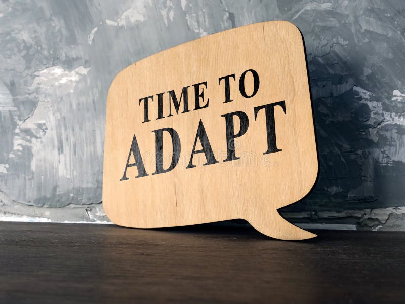 Time To Adapt Phrase on the Wooden Desk. Stock Image - Image of future ...