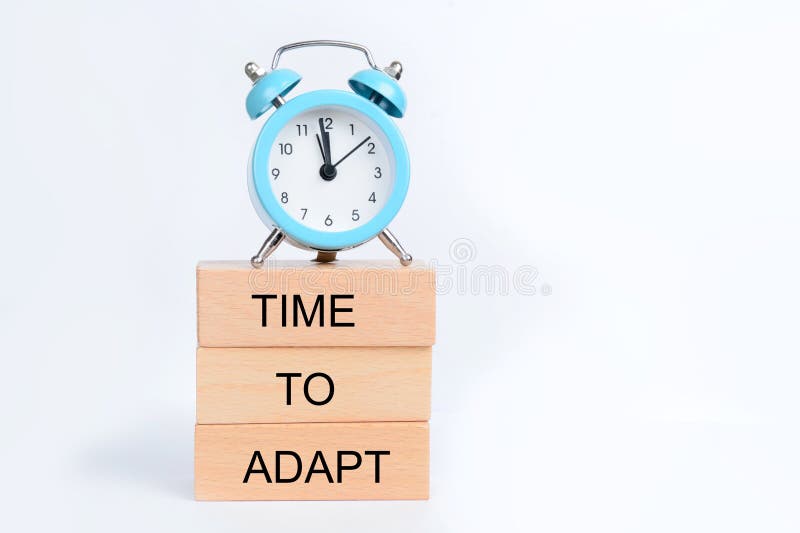 TIME TO ADAPT Text on Notebook with Pen, Folder on a Chart Background ...