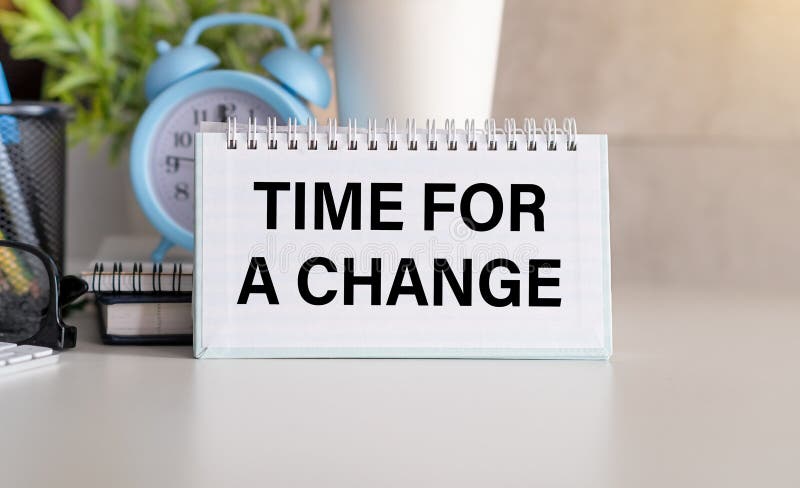 TIME TO CHANGE Word Written on Notepad. TIME TO CHANGE Text on Table ...