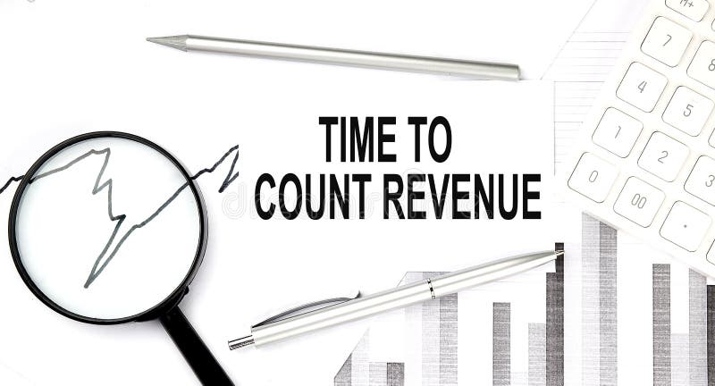 TIME TO COUNT REVENUE Document with Pen,graph and Magnifier,calculator ...