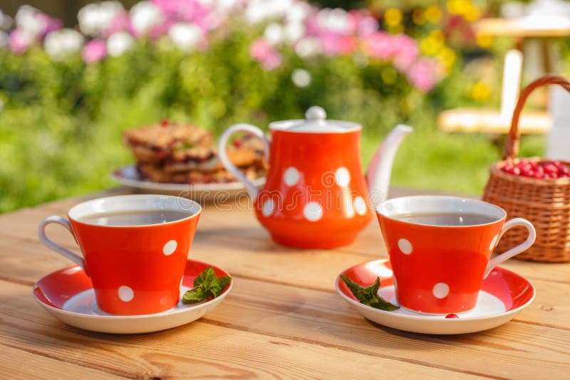 Time To Drink Tea Outdoors in the Garden. Summertime Scene Stock Photo ...