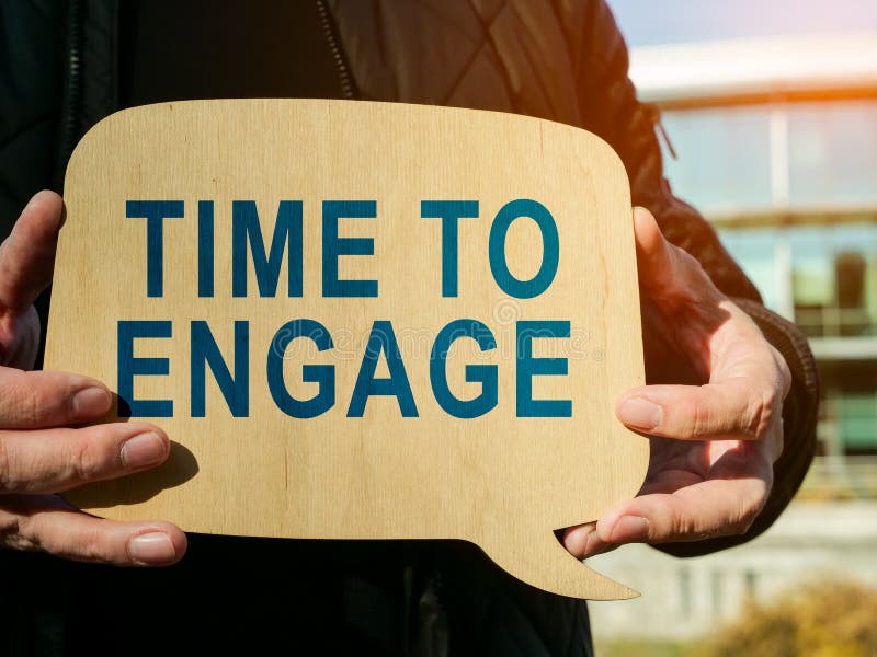 Time To Engage is Shown Using the Text and Picture of Clock Stock Image ...