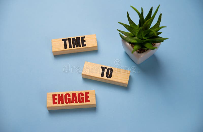 Time To Engage is Shown Using the Text and Picture of Clock Stock Image ...
