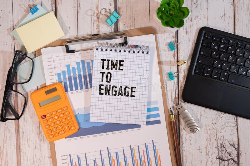 Time To Engage is Shown Using the Text and Picture of Clock Stock Image ...