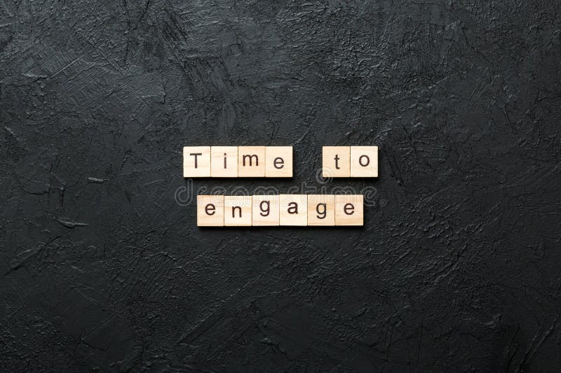 Time To Engage is Shown Using the Text and Picture of Clock Stock Image ...