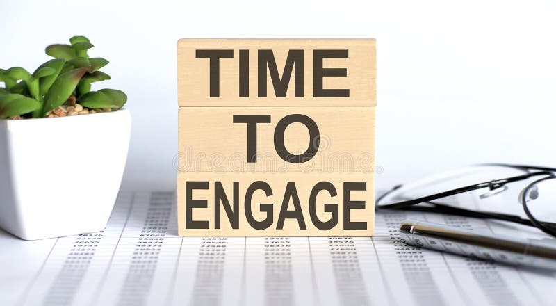 Time To Engage - Words from on Wooden Blocks with Letters, the Time is ...
