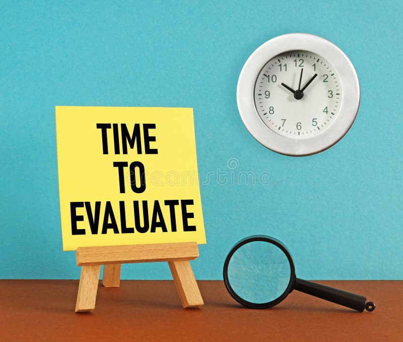 Time To Evaluate is Shown Using the Text and Photo of the Clock Stock ...