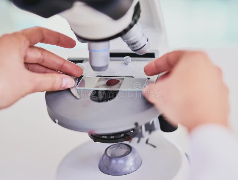 Time To Examine a New Sample. Closeup Shot of a Scientist Using a ...