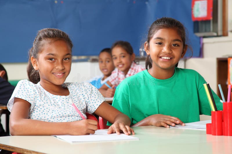 Time To Learn Two Cheerful School Girls in Class Stock Image - Image of ...