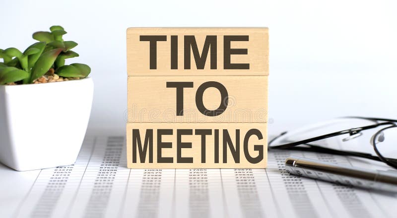 TIME TO MEETING Text on the Wooden Cubes on the Chart Stock Image ...