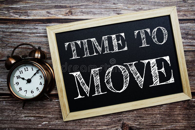 Time To Move Word with Alarm Clock on Wooden Background Stock Image ...
