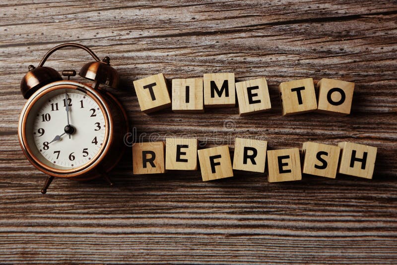 Time To Refresh Alphabet Letter with Alarm Clock on Wooden Background ...