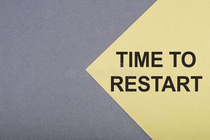 Time To Restart Written on Yellow Paper on a Gray Surface Stock Image ...