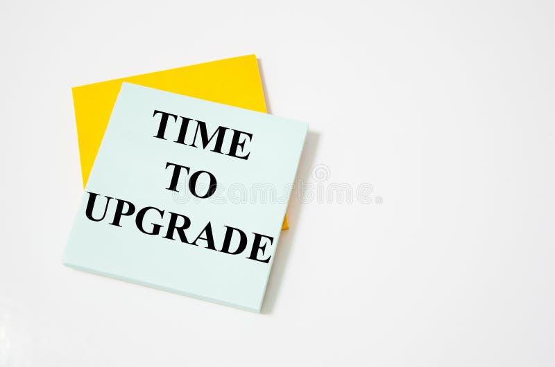 Time To Update Text Written on a White Notepad with Colored Pencils and ...