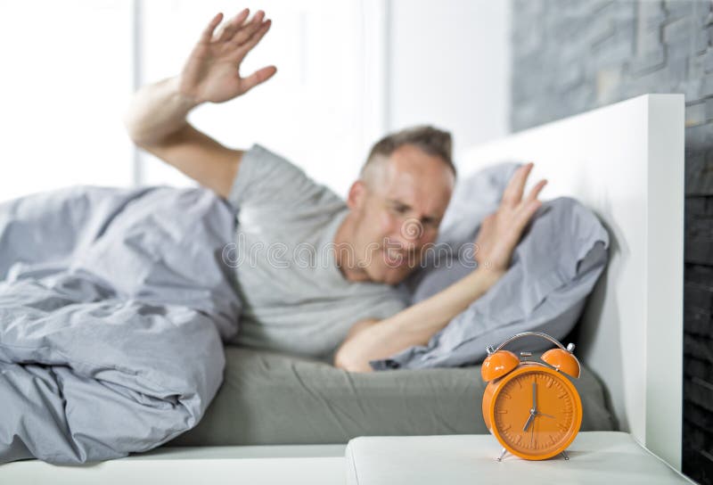 Time To Wake Up. Tired Man in the Bed Stock Photo - Image of reaching ...