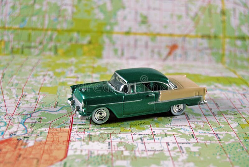 Vintage car on road map stock image. Image of atlas, location - 2963561