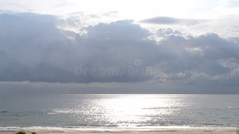 Timelapse. Large Rain Clouds Move in Sky Above the Sea Surface on a ...