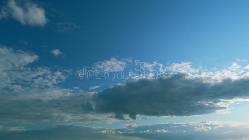 Floating Fluffy Clouds. Beautiful Sunny Blue Sky with Wispy Smoky White ...