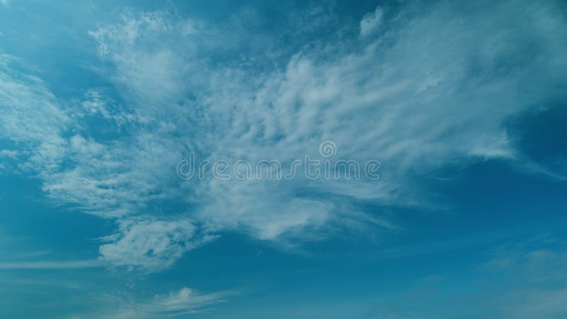 Floating Fluffy Clouds. Beautiful Sunny Blue Sky with Wispy Smoky White ...
