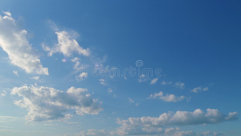 Floating Fluffy Clouds. Two Layers of Cloudiness. Blue Summer Sky with ...