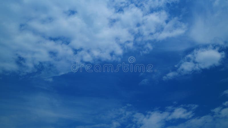Floating Fluffy Clouds. Two Layers of Cloudiness. Blue Summer Sky with ...