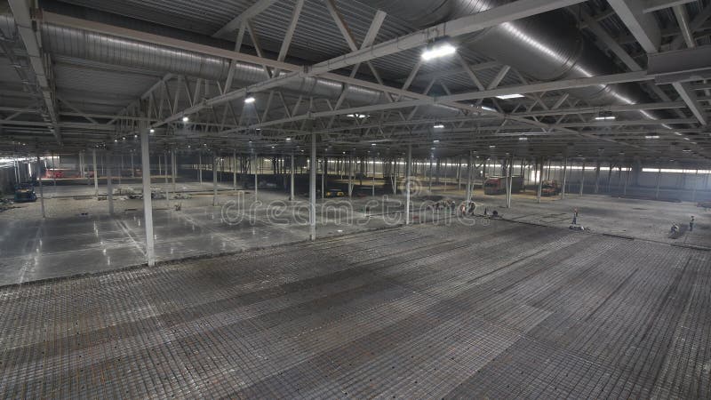 Timelapse of Ground Processing for Floor in Warehouse Stock Footage ...