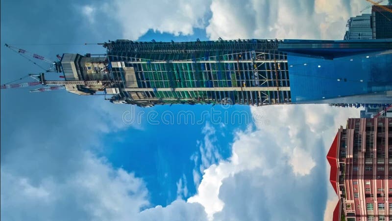 Timelapse of High-rise Construction Site, Blue Sky, Big Clouds at Day ...