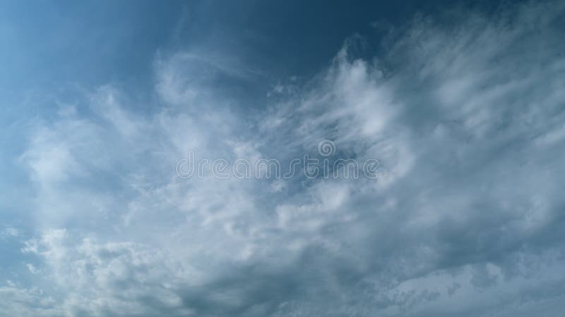 Light High Clouds Slide on Sky. Layer of Clouds in Blue Sky Moving ...