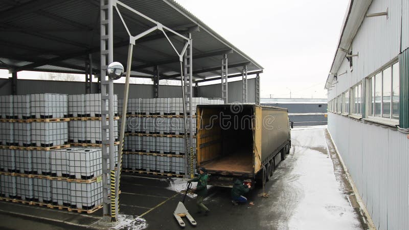 Timelapse Loaders Fill Trucks at Bulk Containers Ramp Stock Video ...