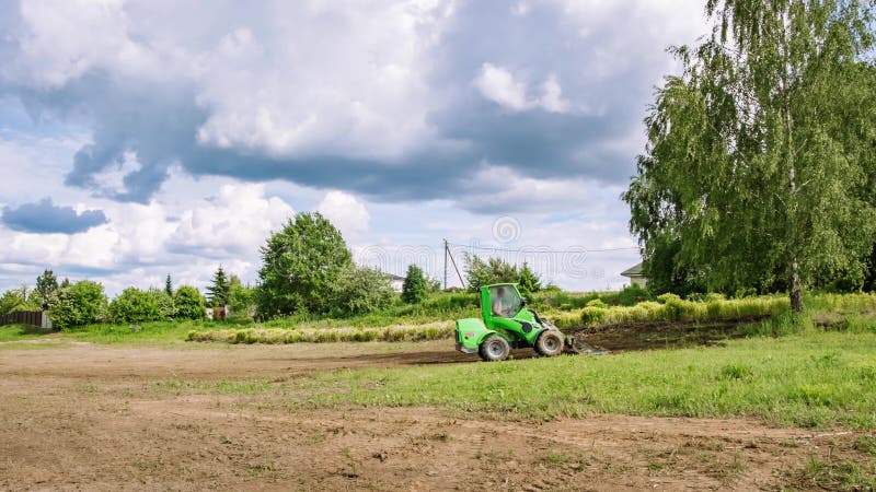 Timelapse. Mini Skid Steer Loader Clear the Construction Site Stock ...