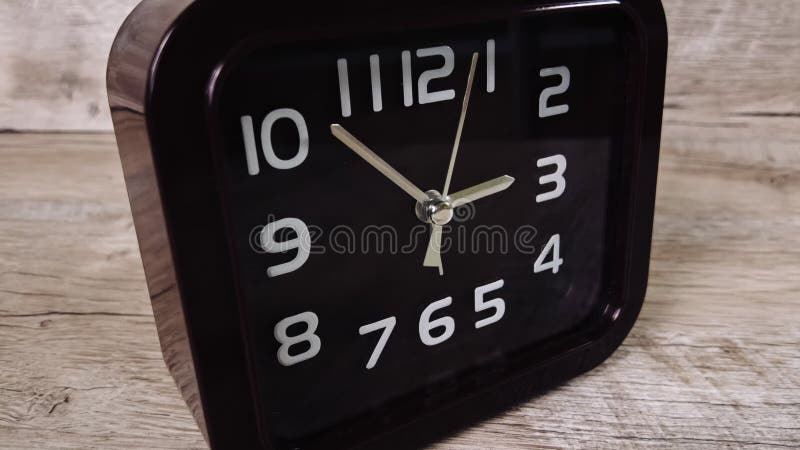 Timelapse of Pointer Clock on a Wooden Table Shows Time, Spinning Clock ...