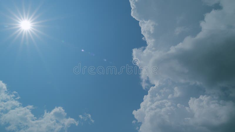 Rays of Sun through Clouds. Blue Sky with Cloudscape Backlit Bright Sunlight through Summer ...