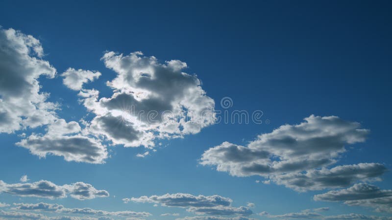 Rays of Sun through Clouds. Blue Sky with Cloudscape Backlit Bright ...