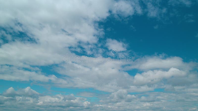 Sky with Several Layers of Clouds Moving in Different Directions. Sun ...