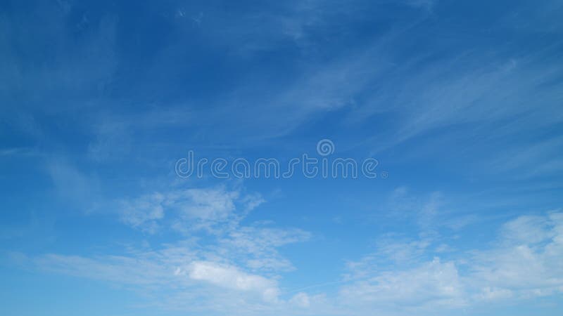 Sky with Several Layers of Clouds Moving in Different Directions. Sun ...