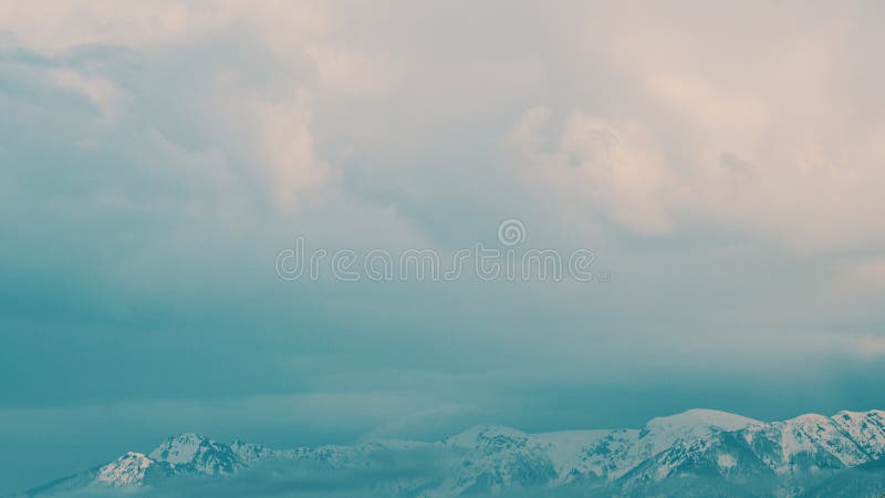 Stunning Mountain Range on a Cloudy Day. Distant Dark Mountain Hills ...